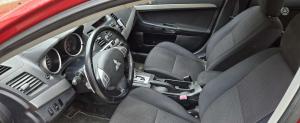 Red Mitsubishi Lancer 2009 in Vilnius, with an engine capacity of 1.80 L and mileage of 230 thousand km for 2150 €, photo 14 on AUTOMOTO.COM.LV
