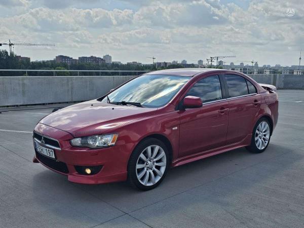Sarkans Mitsubishi Lancer 2010 Viļņa, ar dzinēja tilpumu 1.80 L un nobraukumu 201 tūkst. km par 1850 €, foto 3 vietnē AUTOMOTO.COM.LV