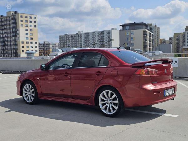Sarkans Mitsubishi Lancer 2010 Viļņa, ar dzinēja tilpumu 1.80 L un nobraukumu 201 tūkst. km par 1850 €, foto 7 vietnē AUTOMOTO.COM.LV