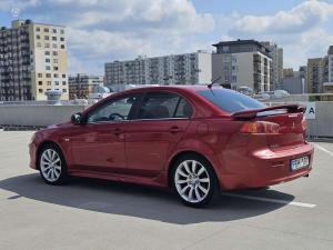Red Mitsubishi Lancer 2010 in Vilnius, with an engine capacity of 1.80 L and mileage of 201 thousand km for 1850 €, photo 8 on AUTOMOTO.COM.LV