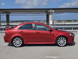Red Mitsubishi Lancer 2010 in Vilnius, with an engine capacity of 1.80 L and mileage of 201 thousand km for 1850 €, photo 10 on AUTOMOTO.COM.LV