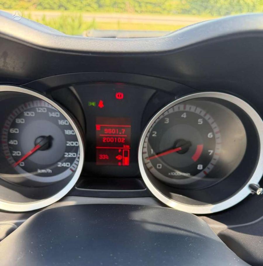 Red Mitsubishi Lancer 2010 in Vilnius, with an engine capacity of 1.80 L and mileage of 201 thousand km for 1850 €, photo 12 on AUTOMOTO.COM.LV