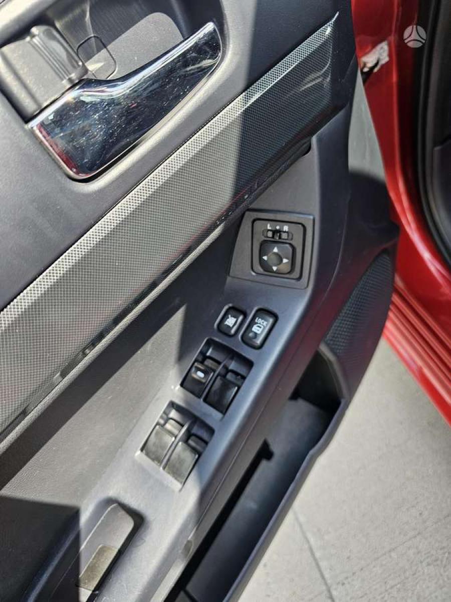 Red Mitsubishi Lancer 2010 in Vilnius, with an engine capacity of 1.80 L and mileage of 201 thousand km for 1850 €, photo 20 on AUTOMOTO.COM.LV