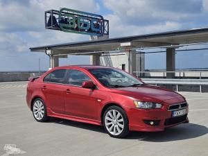 Red Mitsubishi Lancer 2010 in Vilnius, with an engine capacity of 1.80 L and mileage of 201 thousand km for 1850 €, photo  on AUTOMOTO.COM.LV