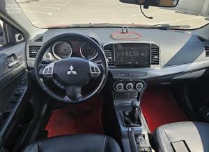 Red Mitsubishi Lancer 2010 in Vilnius, with an engine capacity of 1.80 L and mileage of 201 thousand km for 1850 €, photo 3 on AUTOMOTO.COM.LV