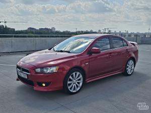Red Mitsubishi Lancer 2010 in Vilnius, with an engine capacity of 1.80 L and mileage of 201 thousand km for 1850 €, photo 4 on AUTOMOTO.COM.LV