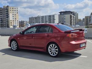 Red Mitsubishi Lancer 2010 in Vilnius, with an engine capacity of 1.80 L and mileage of 201 thousand km for 1850 €, photo 9 on AUTOMOTO.COM.LV