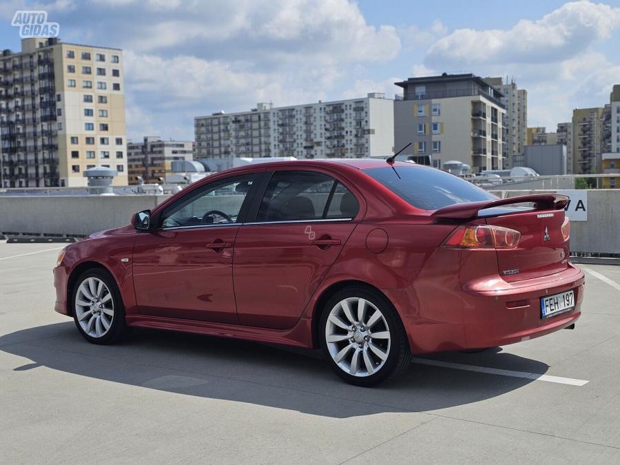 Red Mitsubishi Lancer 2010 in Vilnius, with an engine capacity of 1.80 L and mileage of 201 thousand km for 1850 €, photo 9 on AUTOMOTO.COM.LV