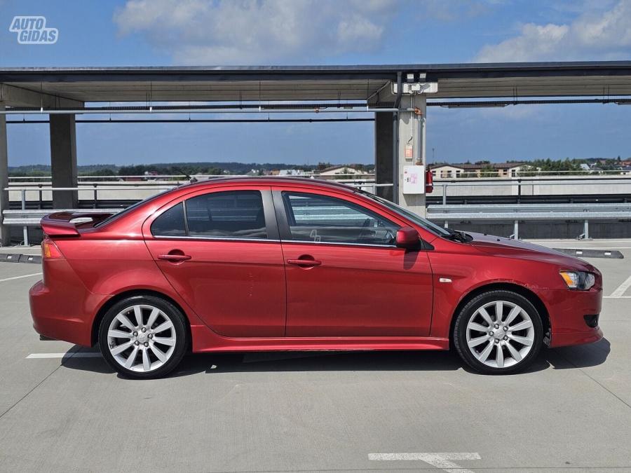 Red Mitsubishi Lancer 2010 in Vilnius, with an engine capacity of 1.80 L and mileage of 201 thousand km for 1850 €, photo 11 on AUTOMOTO.COM.LV
