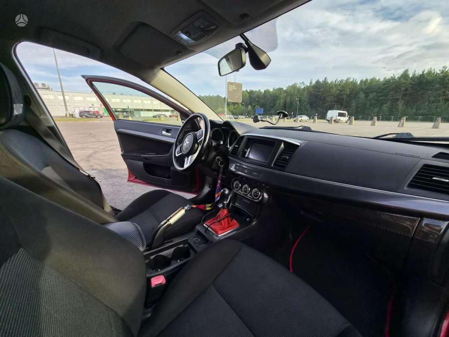 Красный Мицубиси Лансер 2010 в Вильнюс, объемом двигателя 2.00 л и пробегом 243 тыс. км за 3500 €, фото 25 на AUTOMOTO.COM.LV