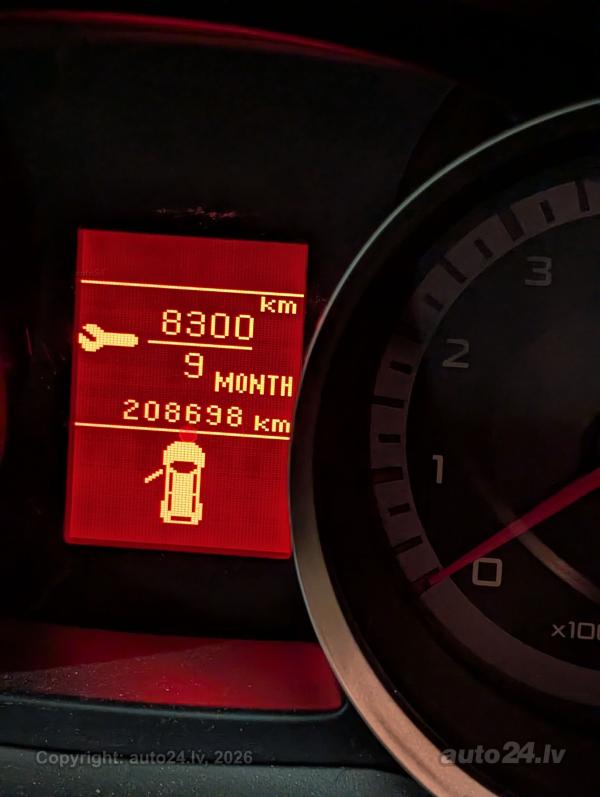 Red Mitsubishi Lancer 2010 in Tallinn, with an engine capacity of 1.80 L and mileage of 210 thousand km for 2499 €, photo 8 on AUTOMOTO.COM.LV