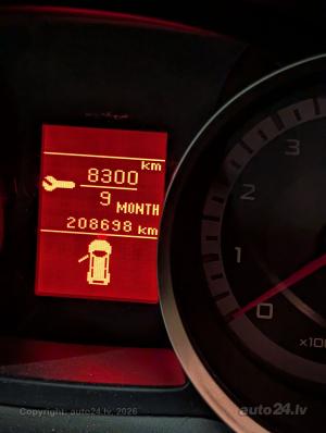 Red Mitsubishi Lancer 2010 in Tallinn, with an engine capacity of 1.80 L and mileage of 210 thousand km for 2499 €, photo 8 on AUTOMOTO.COM.LV