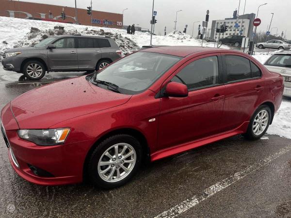 Sarkans Mitsubishi Lancer 2014 Viļņa, ar dzinēja tilpumu 1.59 L un nobraukumu 147 tūkst. km par 3800 €, foto 1 vietnē AUTOMOTO.COM.LV