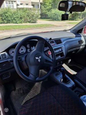 Sarkans Mitsubishi Lancer 2007 Viļņa, ar dzinēja tilpumu 1.58 L un nobraukumu 160 tūkst. km par 2000 €, foto  vietnē AUTOMOTO.COM.LV