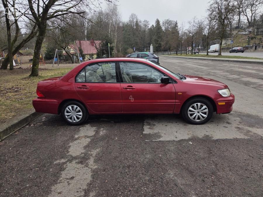 Mitsubishi Lancer 2002 Viļņa, ar dzinēja tilpumu 2.00 L un nobraukumu 120 tūkst. km par 680 €, foto 3 vietnē AUTOMOTO.COM.LV