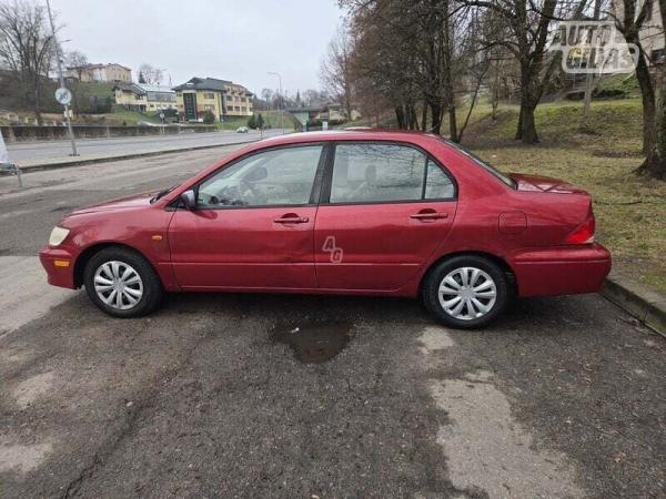 Mitsubishi Lancer 2002 Viļņa, ar dzinēja tilpumu 2.00 L un nobraukumu 1190 tūkst. km par 750 €, foto 5 vietnē AUTOMOTO.COM.LV