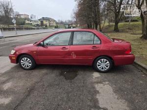Mitsubishi Lancer 2002 Viļņa, ar dzinēja tilpumu 2.00 L un nobraukumu 1190 tūkst. km par 750 €, foto 5 vietnē AUTOMOTO.COM.LV