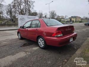 Mitsubishi Lancer 2002 Viļņa, ar dzinēja tilpumu 2.00 L un nobraukumu 1190 tūkst. km par 750 €, foto 6 vietnē AUTOMOTO.COM.LV