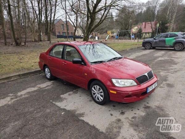 Mitsubishi Lancer 2002 Viļņa, ar dzinēja tilpumu 2.00 L un nobraukumu 1190 tūkst. km par 750 €, foto 9 vietnē AUTOMOTO.COM.LV