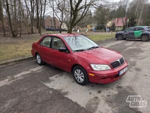 Mitsubishi Lancer 2002 Viļņa, ar dzinēja tilpumu 2.00 L un nobraukumu 1190 tūkst. km par 750 €, foto 9 vietnē AUTOMOTO.COM.LV