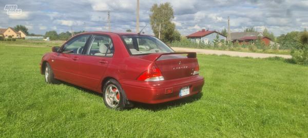 Mitsubishi Lancer 2003 in Kelme, with an engine capacity of 2.00 L and mileage of 320 thousand km for 1200 €, photo 3 on AUTOMOTO.COM.LV