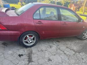 Mitsubishi Lancer 2003 Šauļi, ar dzinēja tilpumu 2.00 L un nobraukumu 250 tūkst. km par 380 €, foto 3 vietnē AUTOMOTO.COM.LV