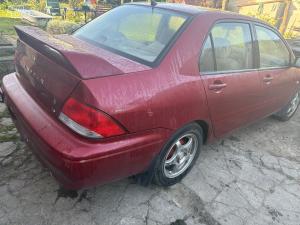 Mitsubishi Lancer 2003 Šauļi, ar dzinēja tilpumu 2.00 L un nobraukumu 250 tūkst. km par 380 €, foto 4 vietnē AUTOMOTO.COM.LV