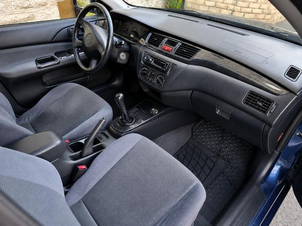 Mitsubishi Lancer 2004 in Tallinn, with an engine capacity of 1.60 L and mileage of 271 thousand km for 2300 €, photo 7 on AUTOMOTO.COM.LV