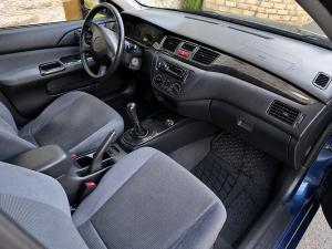 Mitsubishi Lancer 2004 Tallina, ar dzinēja tilpumu 1.60 L un nobraukumu 271 tūkst. km par 2300 €, foto 8 vietnē AUTOMOTO.COM.LV