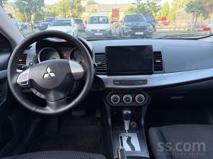 Mitsubishi Lancer 2007 in Riga, with an engine capacity of 1.50 L and mileage of 253 thousand km for 2800 €, photo 11 on AUTOMOTO.COM.LV