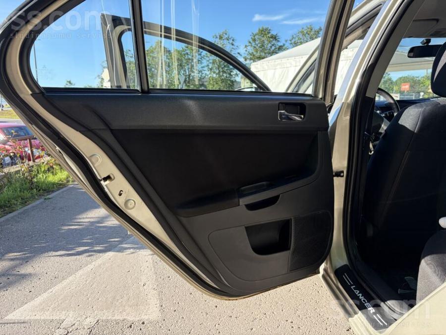 Mitsubishi Lancer 2007 in Riga, with an engine capacity of 1.50 L and mileage of 253 thousand km for 2800 €, photo 18 on AUTOMOTO.COM.LV