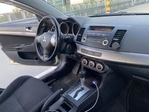 Mitsubishi Lancer 2008 in Vilnius, with an engine capacity of 1.50 L and mileage of 282 thousand km for 3299 €, photo 10 on AUTOMOTO.COM.LV