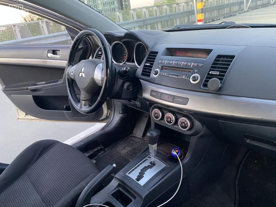 Mitsubishi Lancer 2008 in Vilnius, with an engine capacity of 1.50 L and mileage of 282 thousand km for 3299 €, photo 10 on AUTOMOTO.COM.LV