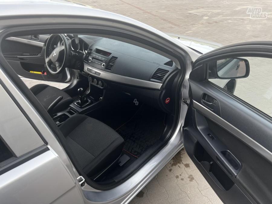 Mitsubishi Lancer 2008 in Vilnius, with an engine capacity of 1.80 L and mileage of 235 thousand km for 3200 €, photo 14 on AUTOMOTO.COM.LV