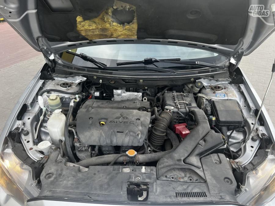 Mitsubishi Lancer 2008 in Vilnius, with an engine capacity of 1.80 L and mileage of 235 thousand km for 3200 €, photo 16 on AUTOMOTO.COM.LV