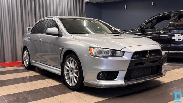 Mitsubishi Lancer 2012 in Marupe, with an engine capacity of 2.00 L and mileage of 185 thousand km for 23990 €, photo 4 on AUTOMOTO.COM.LV