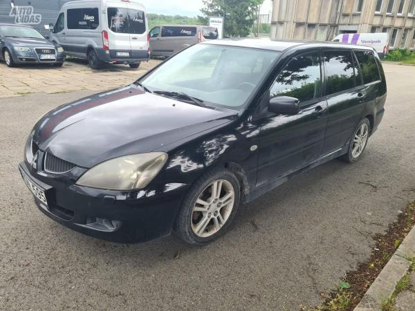 Mitsubishi Lancer 2001 in Klaipeda, with an engine capacity of 1.80 L and mileage of 329 thousand km for 650 €, photo 2 on AUTOMOTO.COM.LV