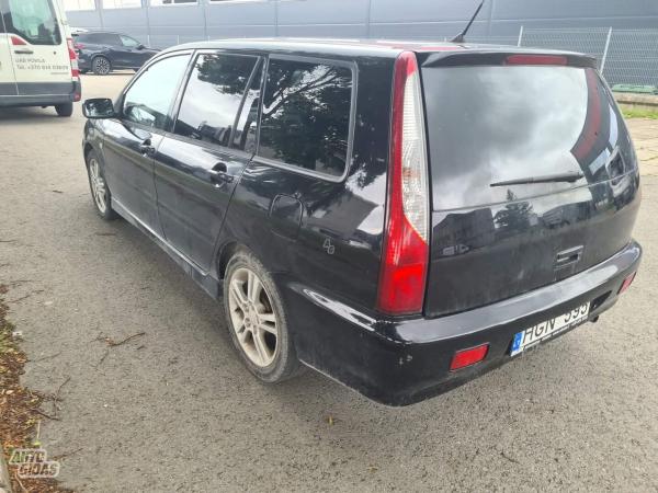 Mitsubishi Lancer 2001 in Klaipeda, with an engine capacity of 1.80 L and mileage of 329 thousand km for 650 €, photo 3 on AUTOMOTO.COM.LV