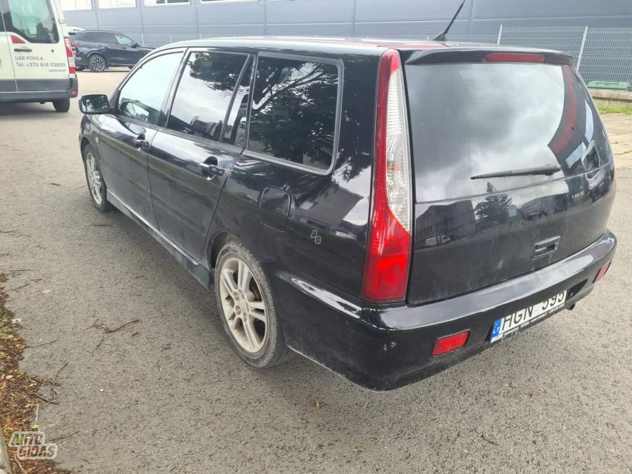 Mitsubishi Lancer 2001 in Klaipeda, with an engine capacity of 1.80 L and mileage of 329 thousand km for 650 €, photo 4 on AUTOMOTO.COM.LV