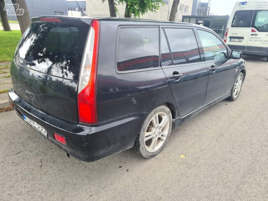 Mitsubishi Lancer 2001 in Klaipeda, with an engine capacity of 1.80 L and mileage of 329 thousand km for 650 €, photo 5 on AUTOMOTO.COM.LV