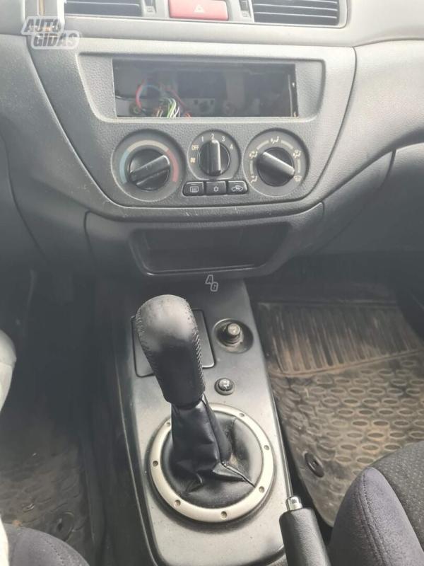 Mitsubishi Lancer 2001 in Klaipeda, with an engine capacity of 1.80 L and mileage of 329 thousand km for 650 €, photo 6 on AUTOMOTO.COM.LV