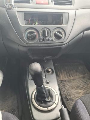 Mitsubishi Lancer 2001 in Klaipeda, with an engine capacity of 1.80 L and mileage of 329 thousand km for 650 €, photo 7 on AUTOMOTO.COM.LV
