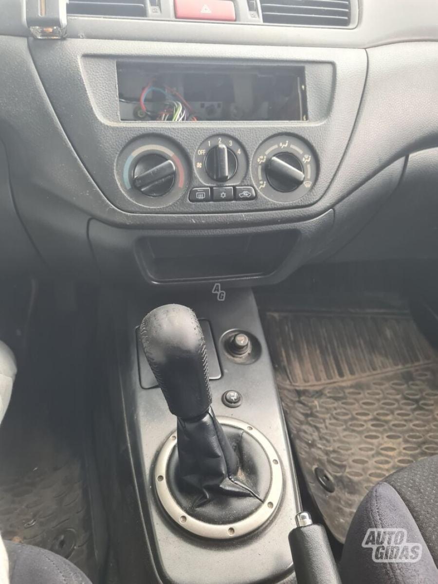 Mitsubishi Lancer 2004 Klaipėda, ar dzinēja tilpumu 2.00 L un nobraukumu 256 tūkst. km par 500 €, foto 6 vietnē AUTOMOTO.COM.LV