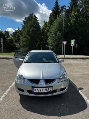 Mitsubishi Lancer 2004 in Kelme, with an engine capacity of 1.70 L and mileage of 156 thousand km for 2000 €, photo 8 on AUTOMOTO.COM.LV