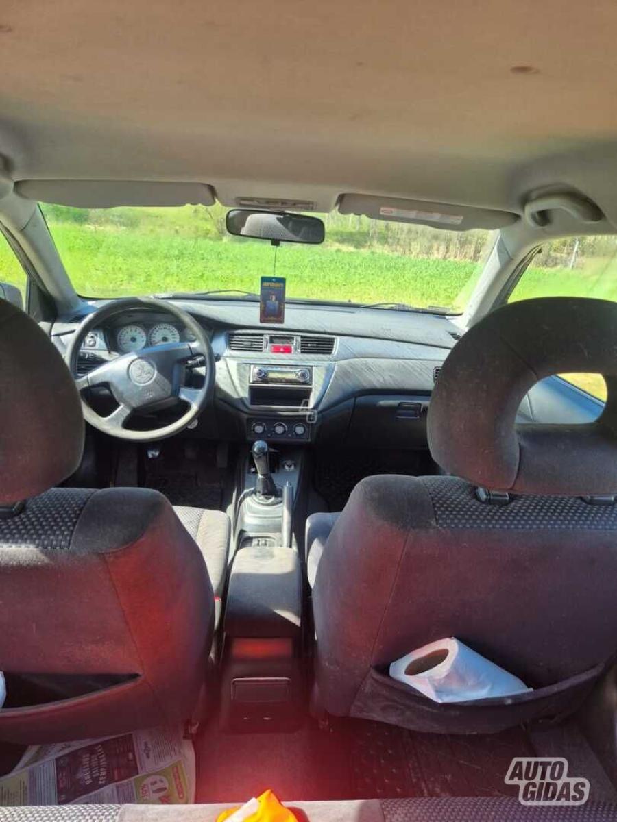 Mitsubishi Lancer 2006 Druskininkai, ar dzinēja tilpumu 1.60 L un nobraukumu 206 tūkst. km par 1750 €, foto 8 vietnē AUTOMOTO.COM.LV