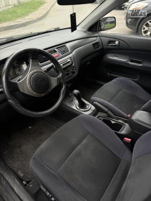 Mitsubishi Lancer 2006 Kauņa, ar dzinēja tilpumu 2.00 L un nobraukumu 220 tūkst. km par 770 €, foto 4 vietnē AUTOMOTO.COM.LV