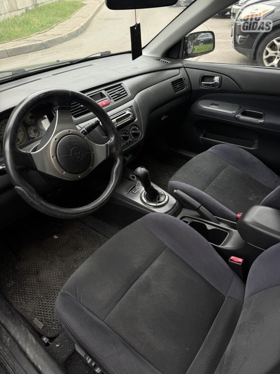 Mitsubishi Lancer 2006 Kauņa, ar dzinēja tilpumu 2.00 L un nobraukumu 220 tūkst. km par 770 €, foto 4 vietnē AUTOMOTO.COM.LV