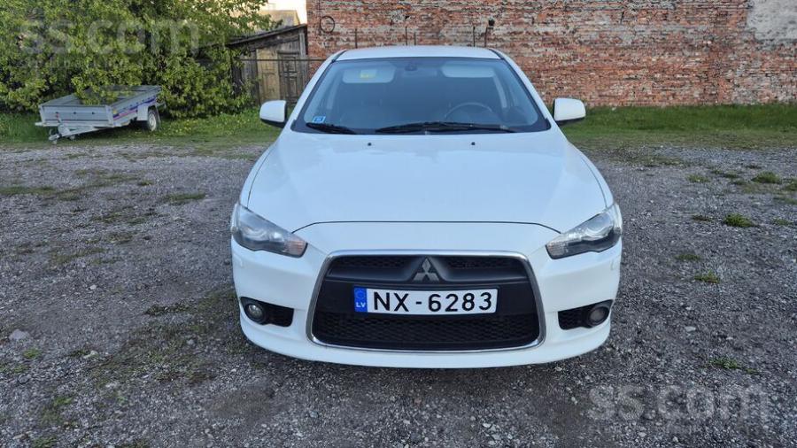 White Mitsubishi Lancer 2009 in Liepaja, with an engine capacity of 1.80 L and mileage of 231 thousand km for 2600 €, photo 2 on AUTOMOTO.COM.LV