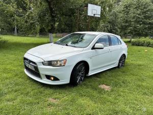 White Mitsubishi Lancer 2009 in Vilnius, with an engine capacity of 1.80 L and mileage of 198 thousand km for 2750 €, photo  on AUTOMOTO.COM.LV