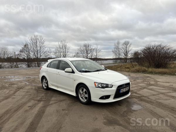 White Mitsubishi Lancer 2012 in Riga, with an engine capacity of 1.80 L and mileage of 217 thousand km for 6000 €, photo 1 on AUTOMOTO.COM.LV